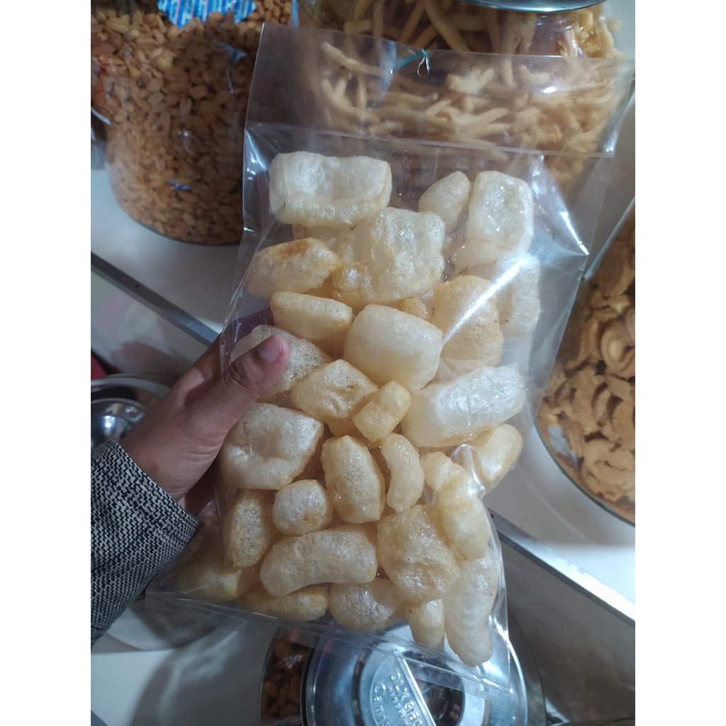 Jual KRUPUK KULIT ORIGINAL PREMIUM/CEMILAN JAJANAN KILOAN/75GR | Shopee ...