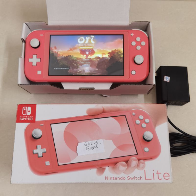 Jual Nintendo Switch Lite Pink Coral Fullset Preloved Bonus Game ...
