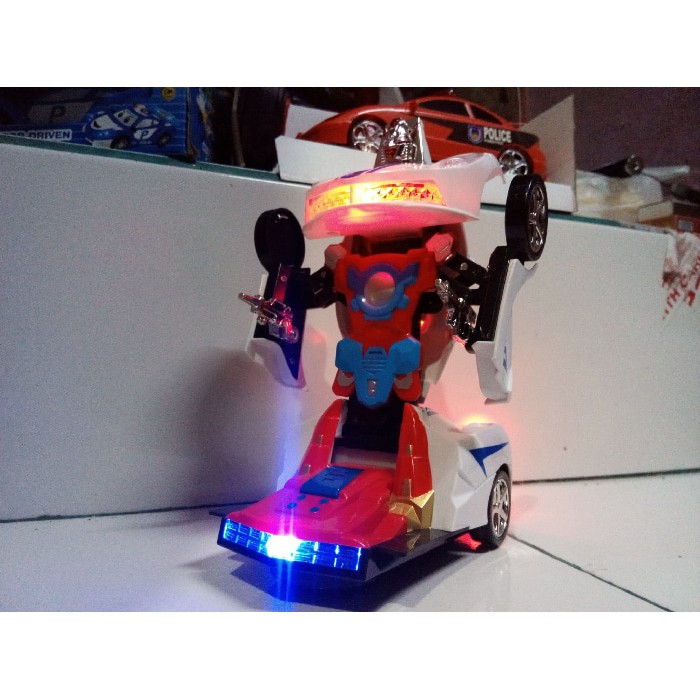 Jual mainan robot polisi transformer 2in1 light and sound gratis 3 ...