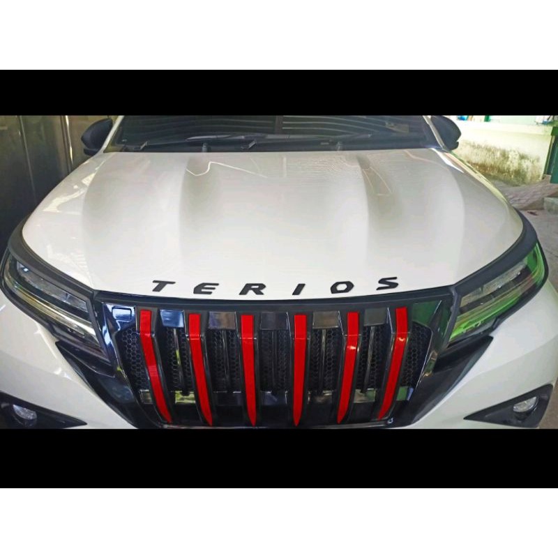 Jual emblem kap mesin terios merah n hitam - hood emblem new terios ...
