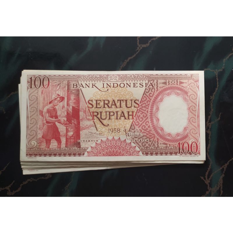 Jual Uang kuno Rp 100 tahun 1964 warna merah seri pekerja penyadap ...