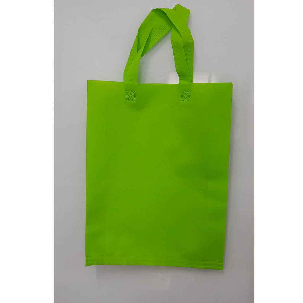 Jual Tas Press Spunbound Tali Goodie Bag Tas Belanja Warna Hijau Muda ...