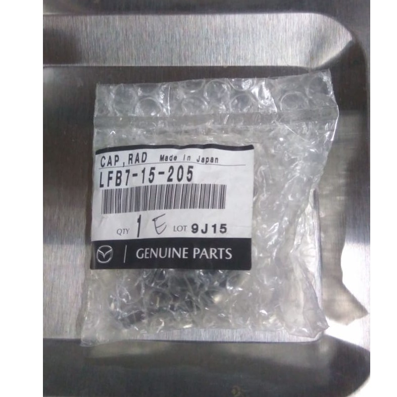 Jual TUTUP RADIATOR MAZDA 2 NON SKYACTIVE LFB715205 ORISINIL | Shopee ...