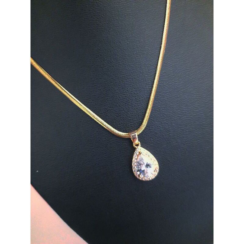 Jual kalung titanium gold belut plus liontin permata putih | Shopee ...