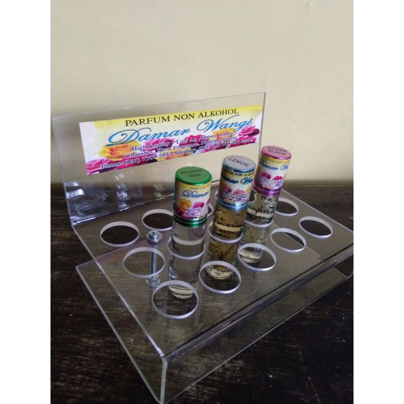 Jual Display parfum acrilik utk botol roll on 6- 10 ml lubang 15 ...