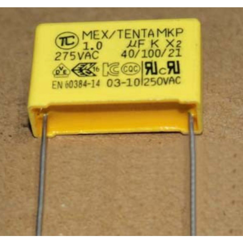Jual Kapasitor capasitor mkp/mkt 104/275volt (1,5cm) isi per 10pcs | Shopee Indonesia