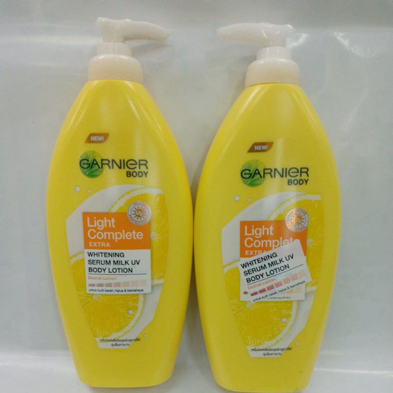 Jual Garnier Light Complete extra whitening serum milk UV body lotion ...