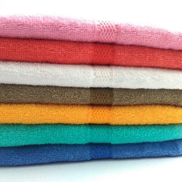 Jual Handuk Polos Mutia putih dan warna ukuran tanggung/anak 50x100cm ...