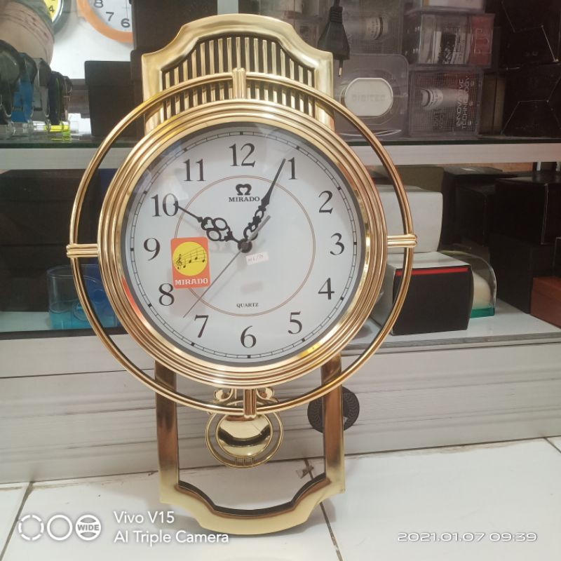 Jual Jam Dinding MIRADO 937 Musik Setiap jam Bunyi Dan Bandul Bergoyang ...