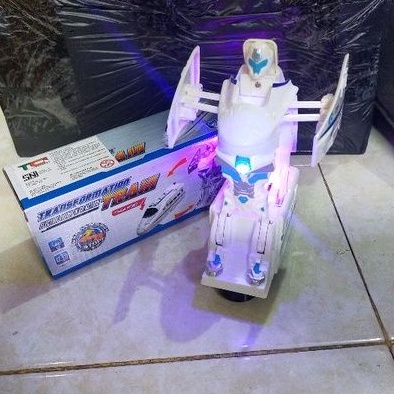 Jual Mainan Mobil Robot Kereta Api Berubah Jadi Robot Jalan Musik Lampu ...
