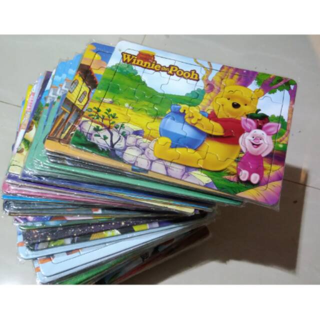 Jual Puzzle karakter jigsaw murah puzle hello kitty frozen pororo tayo ...