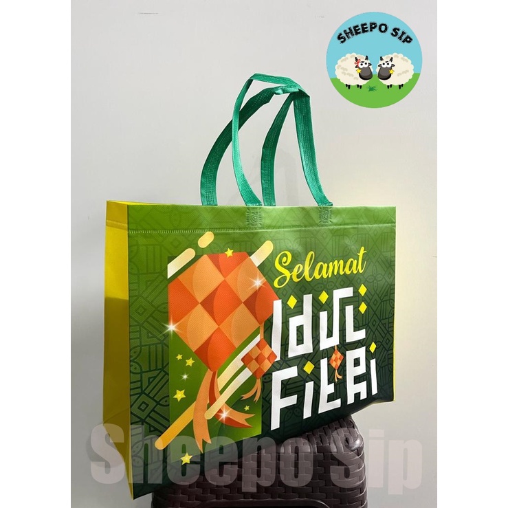 Jual TAS SPUNBOND LAMINASI FULL COLOR - TAS PARCEL LEBARAN PREMIUM ...