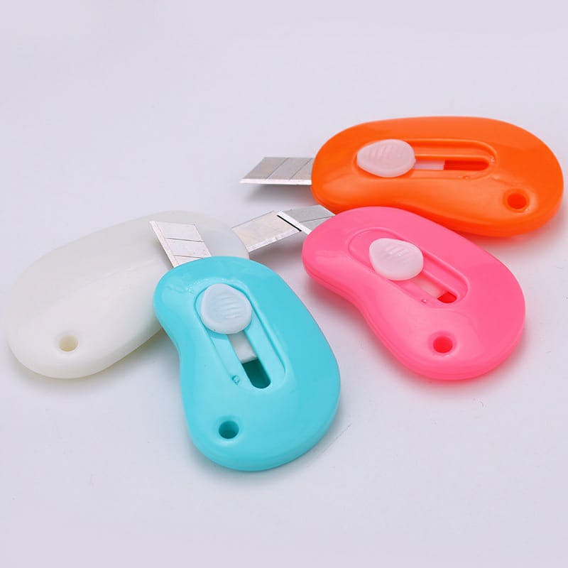 Jual Cutter Mini Portable Bentuk Oval Mini Cutter Polos Travel Kit ...