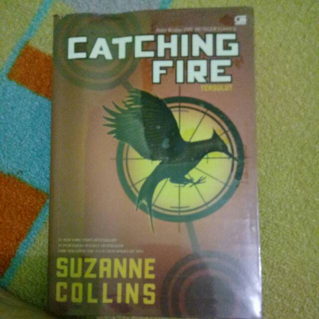 Jual Novel Catching Fire - Suzanne Collins ( Buku kedua The Hunger ...