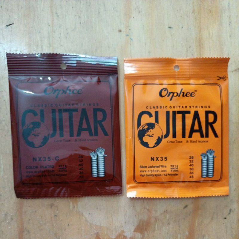 Jual senar gitar/guitar orphee nilon/clasic black dan clear | Shopee ...