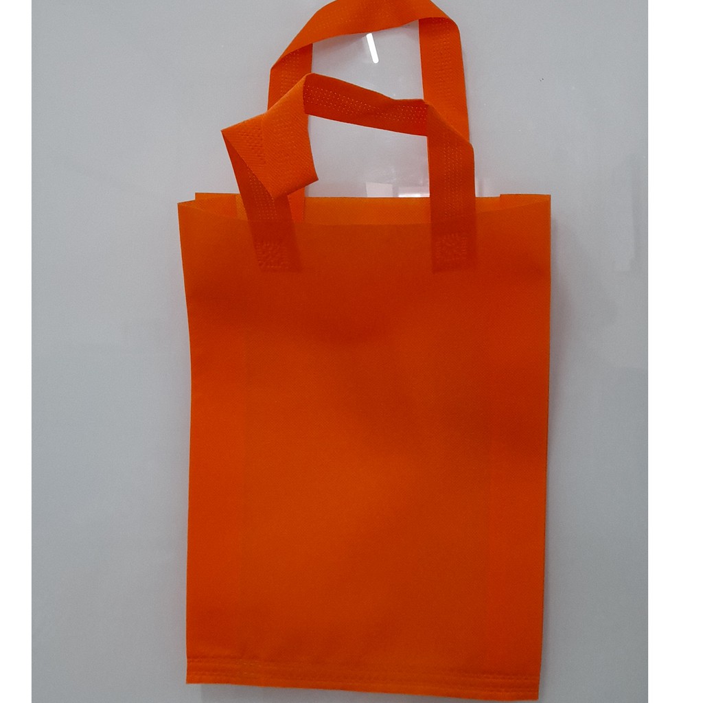 Jual Tas Press Spunbound Tali Goodie Bag Tas Belanja Warna Orens 30 cm ...