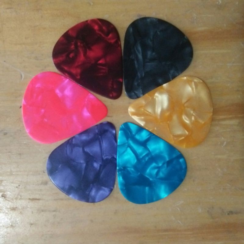 Jual pick kerang/pick gitar/guitar/pik/vik | Shopee Indonesia
