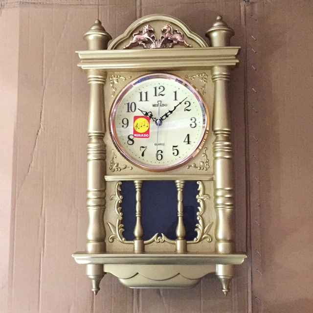 Jual Jam dinding mirado 910 gold gandul dan bunyi | Shopee Indonesia