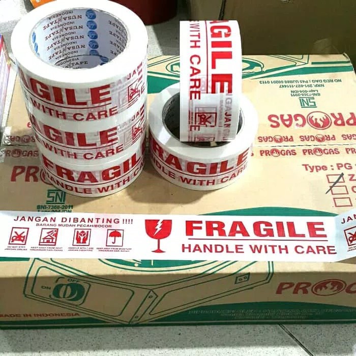 Jual Promo LAKBAN FRAGILE PUTIH KOMBINASI JANGAN DIBANTING NEW !! 100 ...