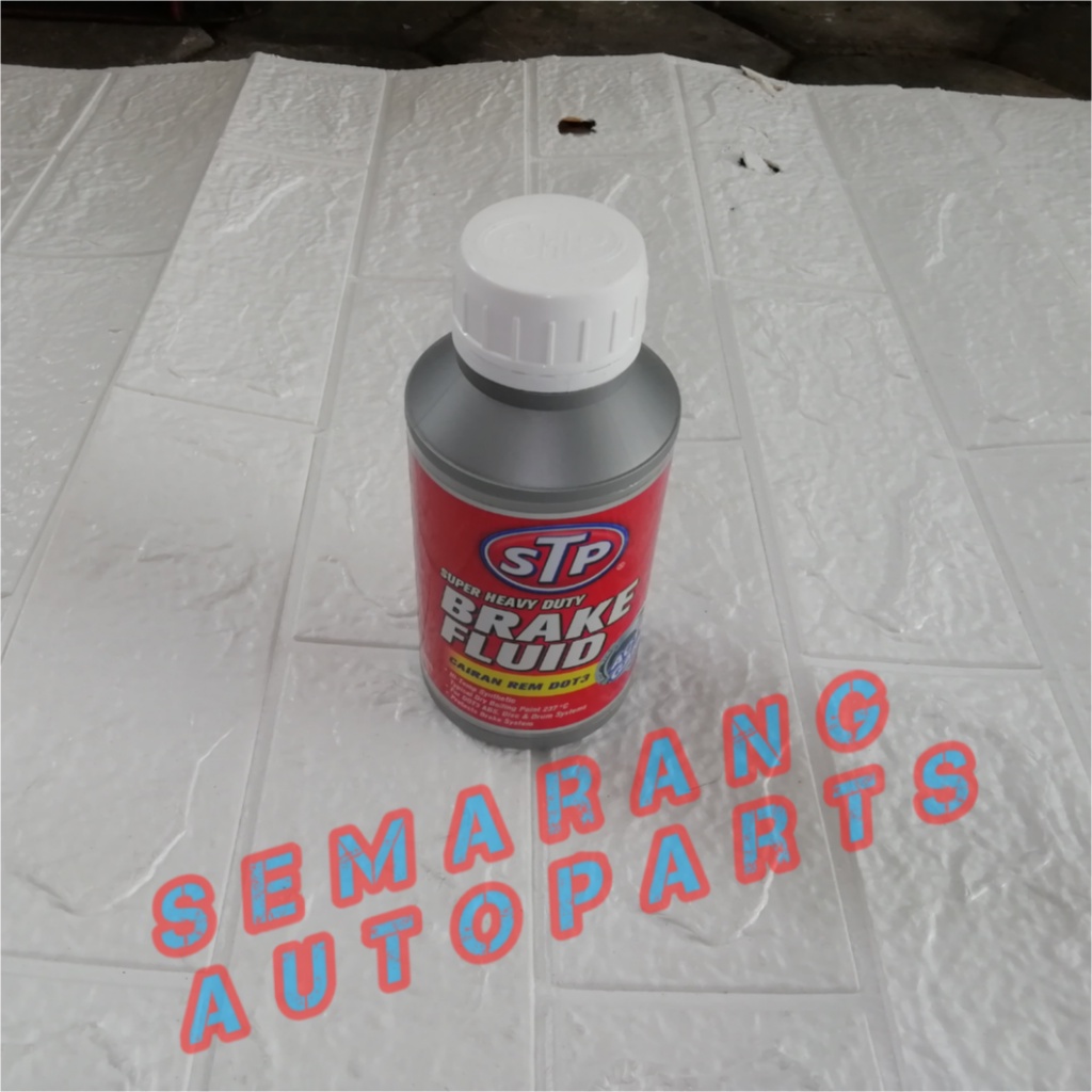 Jual OLI REM MINYAK REM STP DOT 3 BENING brake fluid with activ gard | Shopee Indonesia
