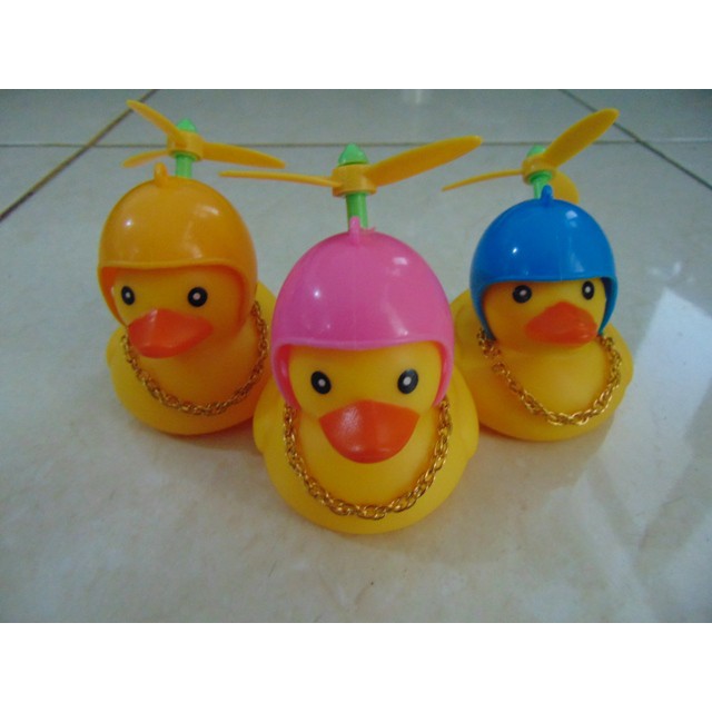 Jual Mainan Bebek Helm Baling-Baling Pakai Kalung Mainan Stang Motor ...