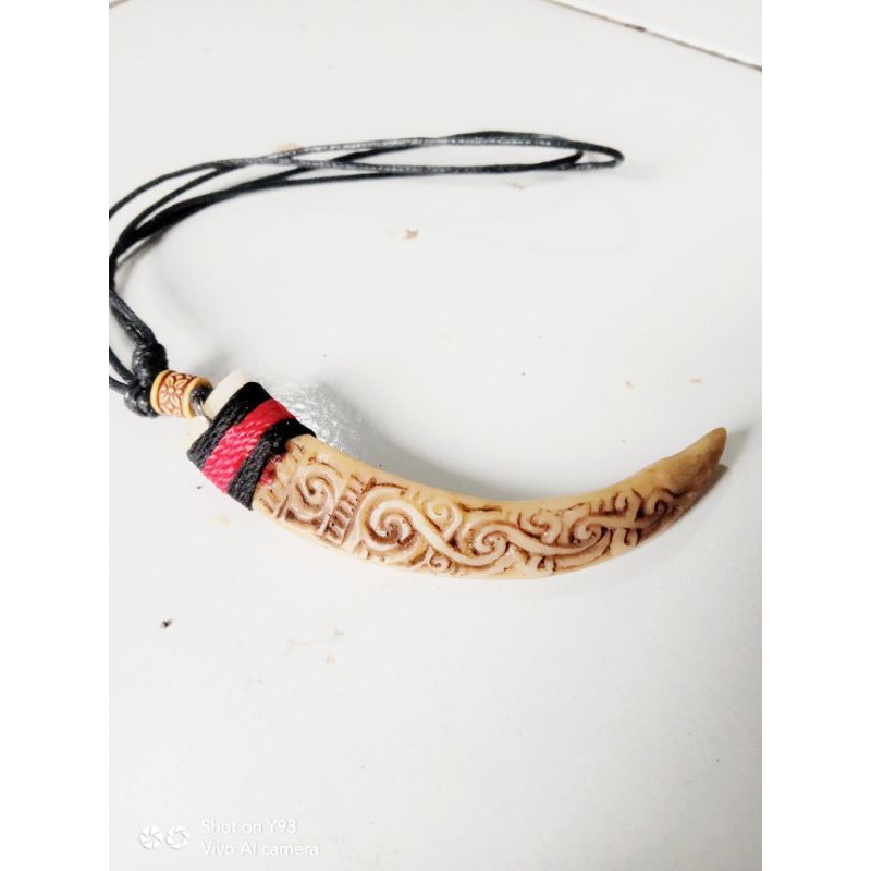 Jual taring babi kalung etnik ukir khas dayak | Shopee Indonesia