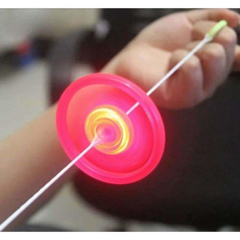 Jual mainan gangsing tarik bunyi + lampu led warna / gasing putar ...