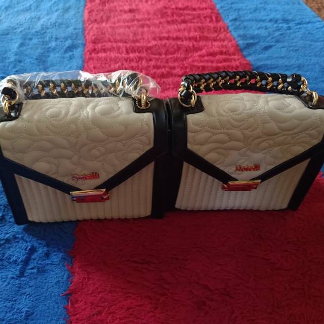 Jual Tas rotelli new ( yang masih segel plastik ) ukuran 17 cmx 19cm x ...