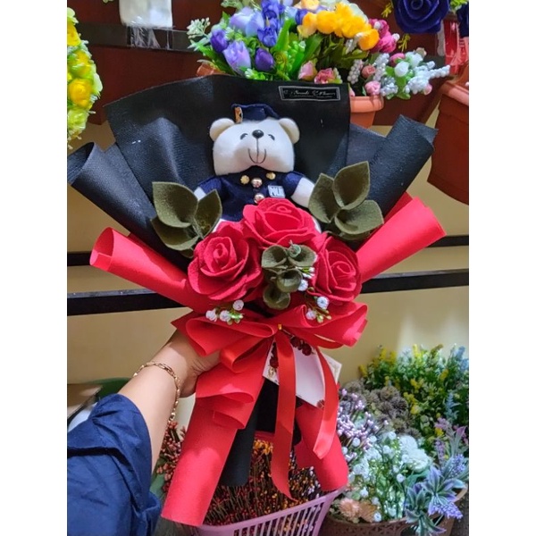 Jual buket boneka polisi / BRIMOB / TNI AL AD buket bunga boneka ...