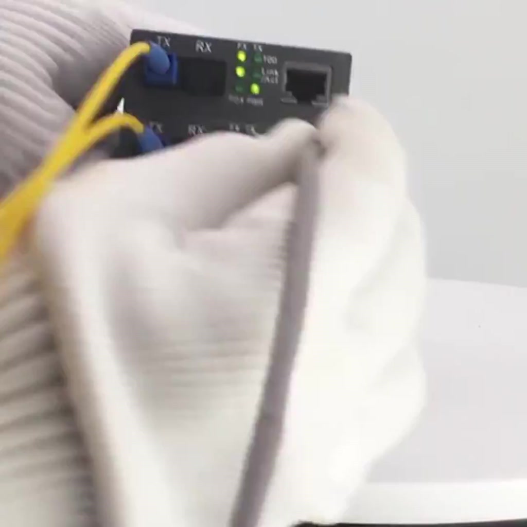 Jual NETLINK HTB 3100 Fiber Optical Media Converter RJ45 20KM 10/100M ...