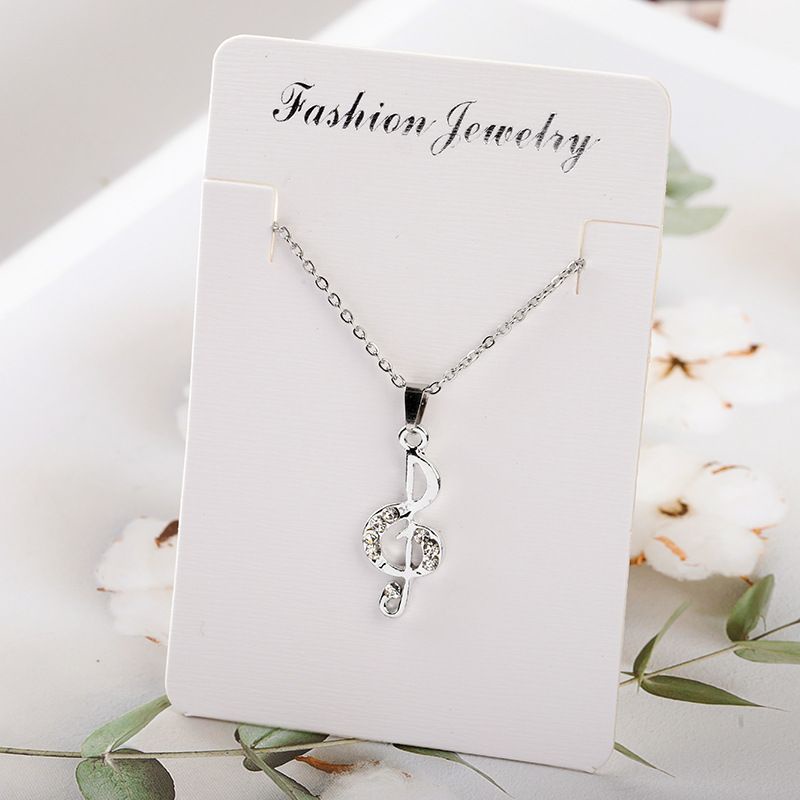 Jual COD! kalung titanium wanita liontin musik melodi anti karat import ...