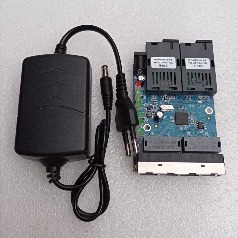 Jual Media Converter 2FO 4LAN 10/100 / 2sc 4rj45 + Adaptor TANPA CASING ...