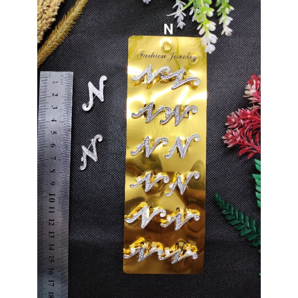 Jual Bros inisial nama / Bros huruf / Bros dagu huruf isi 12pcs ...