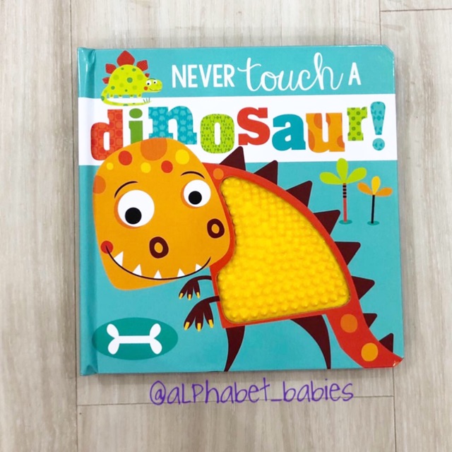 Jual Never Touch a Dinosaur! (Touch and Feel Board book) | Shopee Indonesia