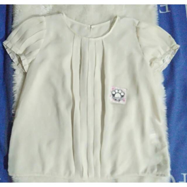 Jual Blouse pendek putih tulang | Shopee Indonesia