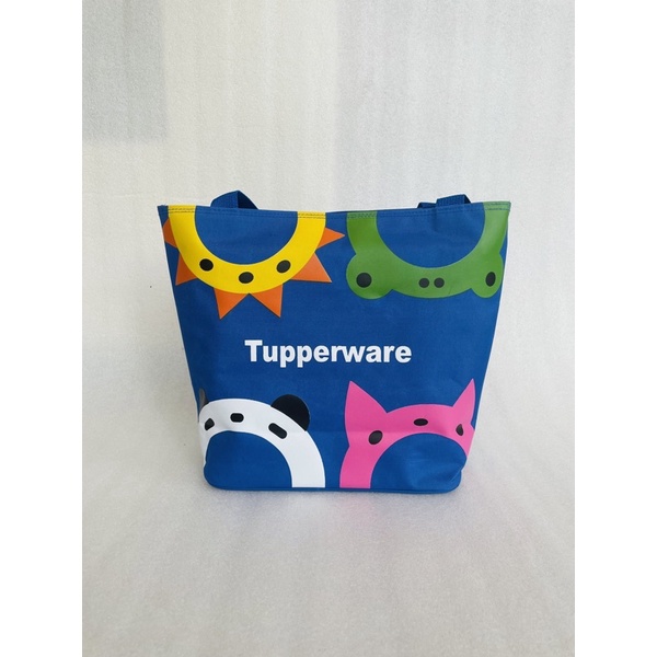 Jual Cosmo Cartoon Tupperware zipper bunga es (tas serbaguna) | Shopee ...