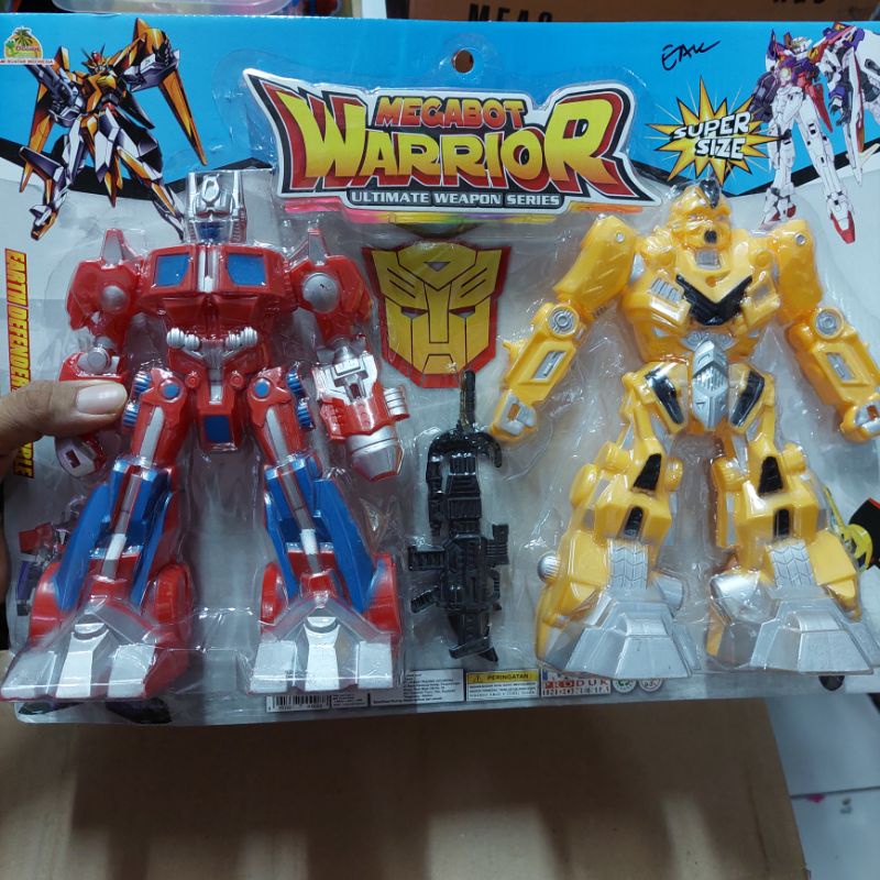 Jual mainan robot transformers isi 2 robot bumble bee dan optimus prime ...