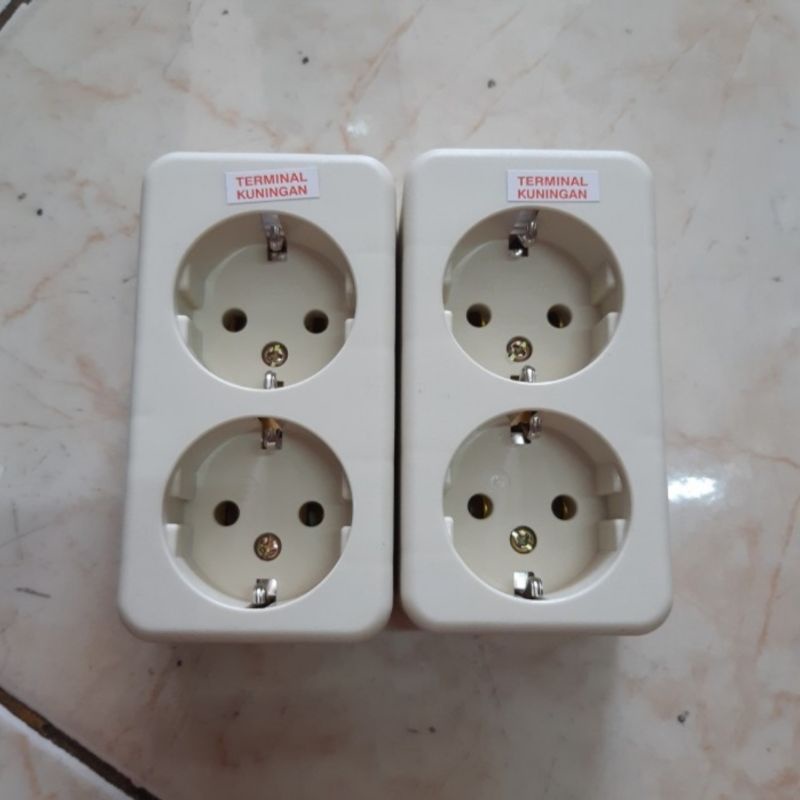Jual stop kontak 2 lubang merek uticon kuningan SNI | Shopee Indonesia