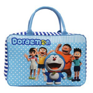 Jual TRAVEL BAG SUPER KANVAS KARAKTER DORAEMON ( TAS KOPER JINJING ...
