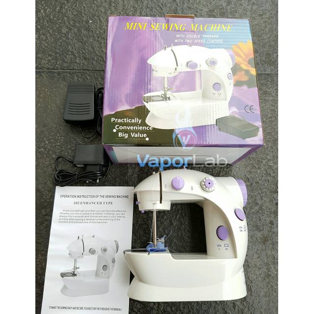 Jual MESIN JAHIT KECIL MINI PORTABLE SEWING MACHINE 202 LAMPU dan ...