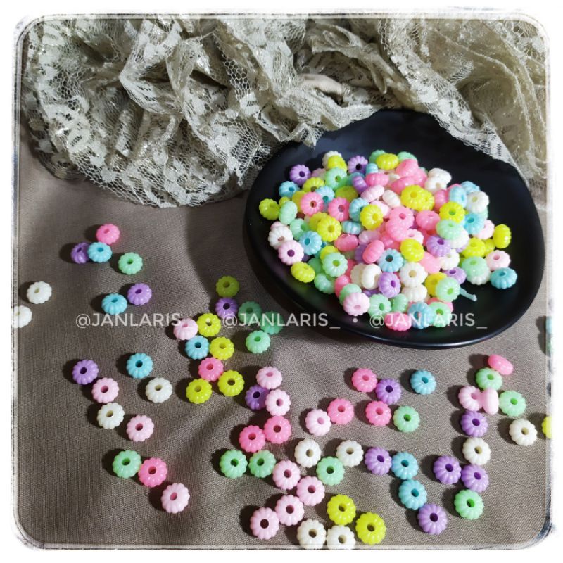 Jual mote bulat pipih gerigi / manik bulat pipih donat 50 gram | Shopee ...