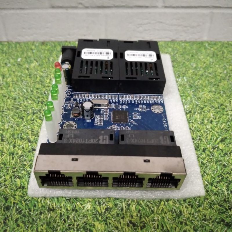 Jual HTB Media Converter 2 port FO 4 port Lan 10/100 Board + Adaptor ...