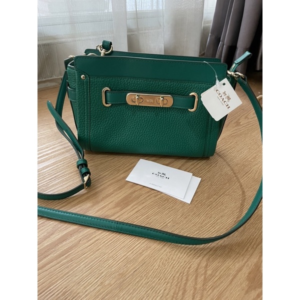 Jual COACH SWAGGER WRISTLET IN PEBBLE LEATHER green. SOLD | Shopee ...