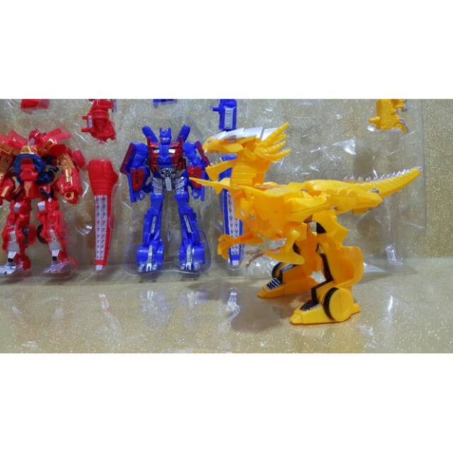 Jual robot transformer set isi 3 optimus prime bumble bee naga dragon ...