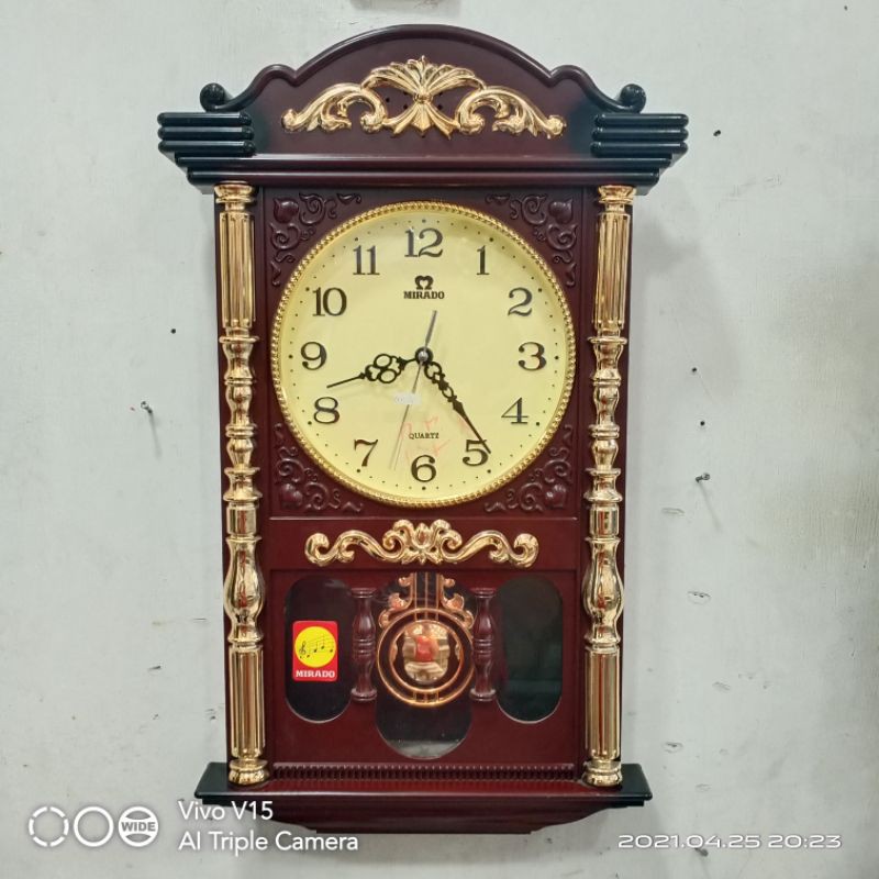 Jual Jam Dinding Mirado 935 Musik Setiap Jam Bunyi & Bandul Bergoyang ...