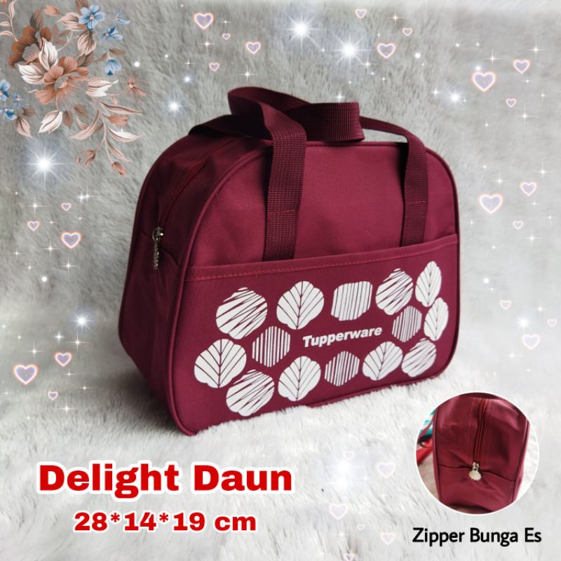 Jual Tas delight Daun ( Zipper bunga Es ) / Tas bekal Tupperware motif ...