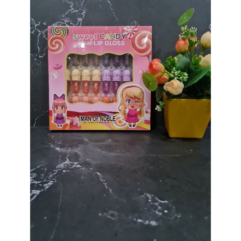 Jual lip gloss IMAN OF NOBLE isi 24 pcs | Shopee Indonesia