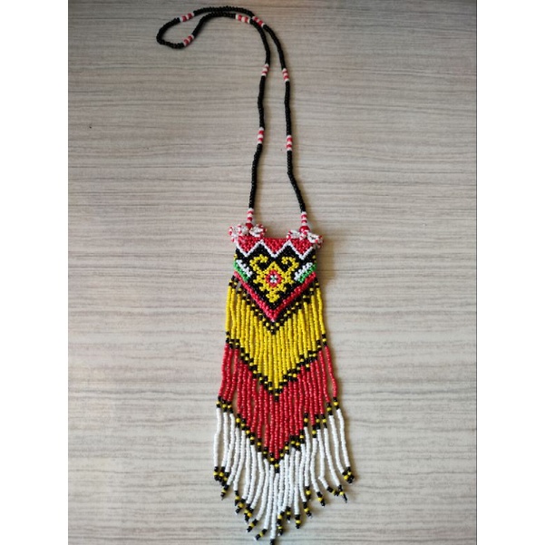 Jual kalung manik etnik dayak tameng ubur ubur gurita lonceng kalung ...