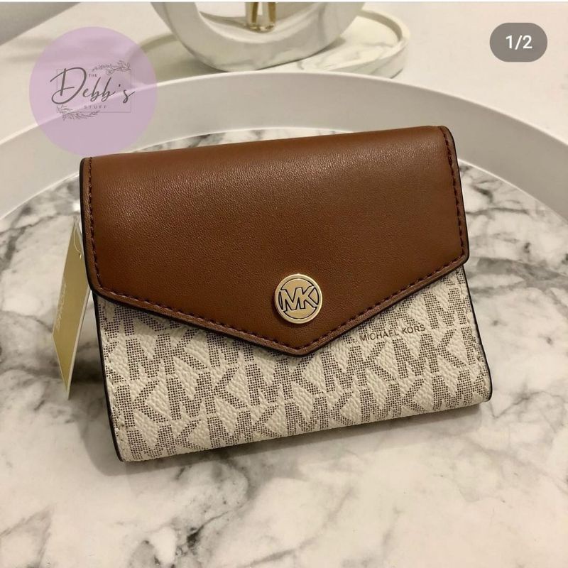 Jual MK Jet Set Travel Medium Flap Bifold Wallet | Vanilla | Shopee ...