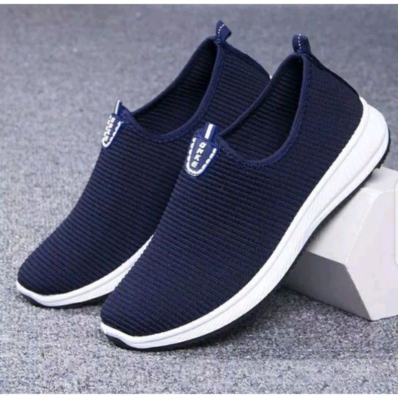 Jual Sepatu Sneaker Pria wanita Slip On Onke santai | Shopee Indonesia